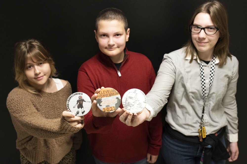 Homecoming buttons blend student art, manufacturing technology ...